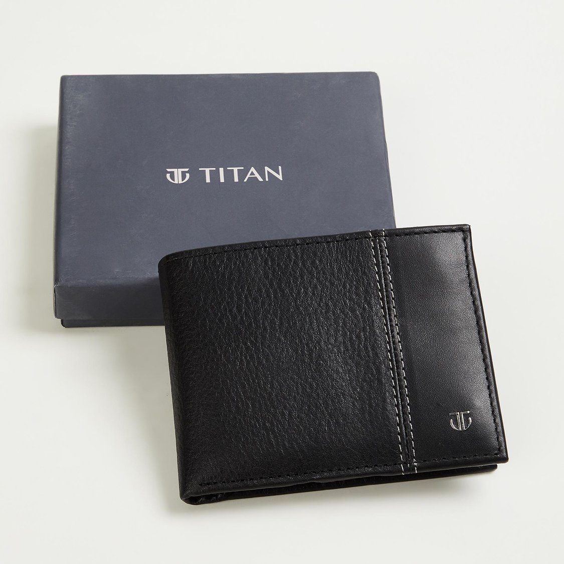 Buy TITAN Men Textured Bi-Fold Leather Wallet from Titan at just INR 1749.0