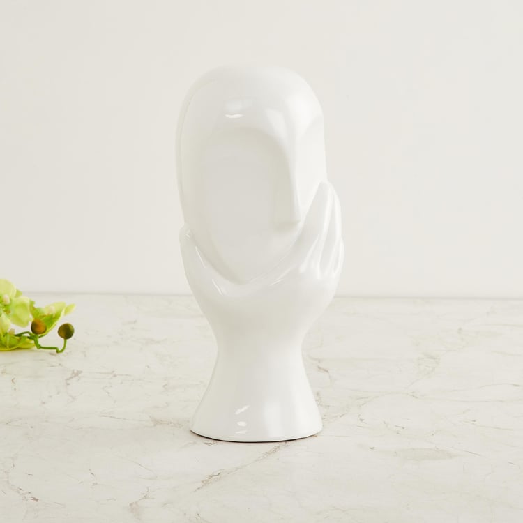 Buy Splendid Face Figurine in Hand from Home Centre at just INR 1199.0