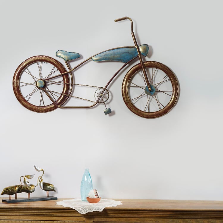 Buy VEDAS Metal Young Bike Wall Art from Vedas at just INR 11999.0