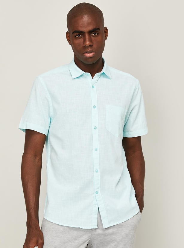 Buy CODE Men Solid Regular Fit Casual Shirt from CODE at just INR 999.0