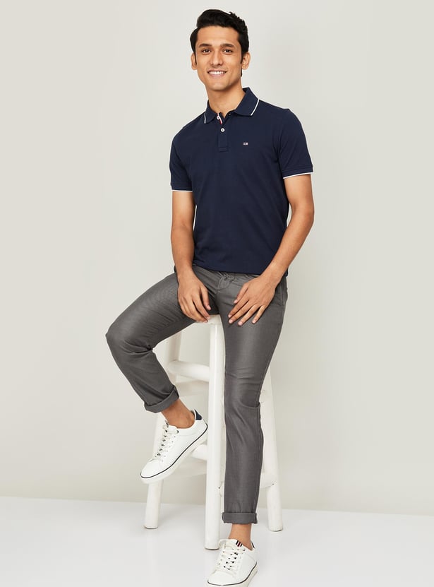 Buy ARROW SPORT Men Solid Polo T-shirt from Arrow Sport at just INR 1299.0