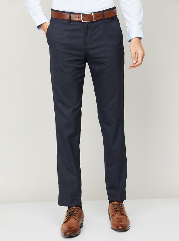 Buy CODE Men Solid Slim Tapered Formal Trousers from CODE at just INR 999.0