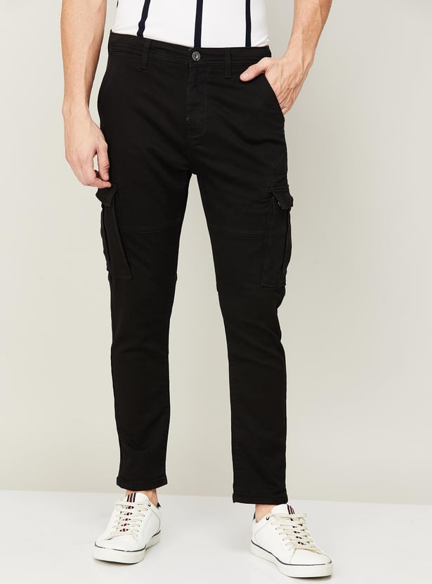 Buy BOSSINI Men Solid Slim Fit Cargo Pants from Bossini at just INR 2699.0