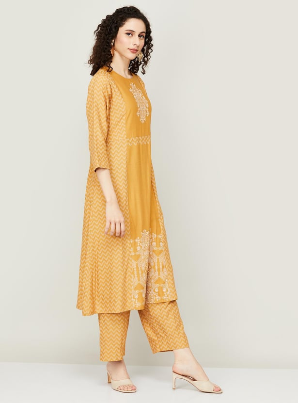 Buy MELANGE Women Printed A-Line Kuta Set from Melange at just INR 2599.0