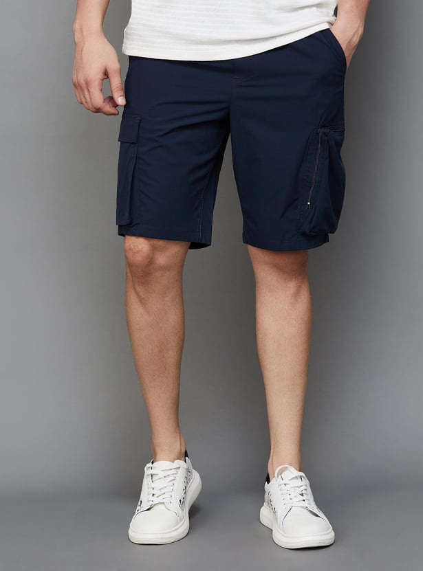 Buy BOSSINI Men Solid Regular Fit Cargo Shorts from Bossini at just INR ...