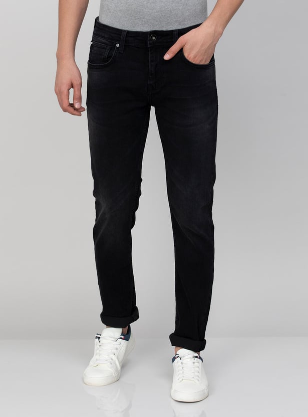 Buy CELIO Men Solid Slim Tapered Dark Jeans from Celio at just INR 2899.0