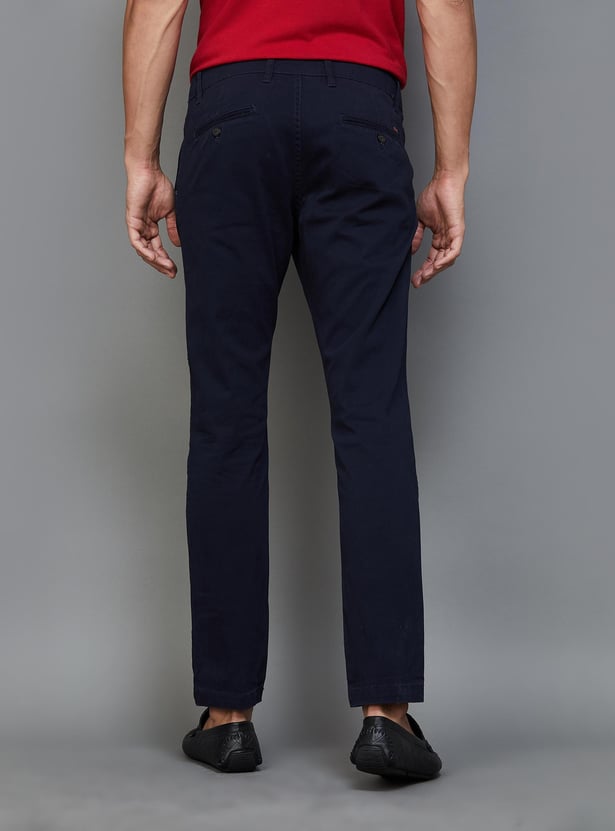 Buy CODE Men Solid Slim Tapered Casual Trousers from CODE at just INR ...