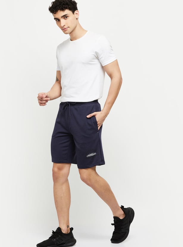 Buy Men Solid Drawstring Closure Shorts Online at just Rs. 499.0 ...