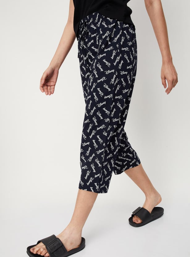 Buy Women Typographic Printed Knit Capris Online at just Rs. 499.0 ...