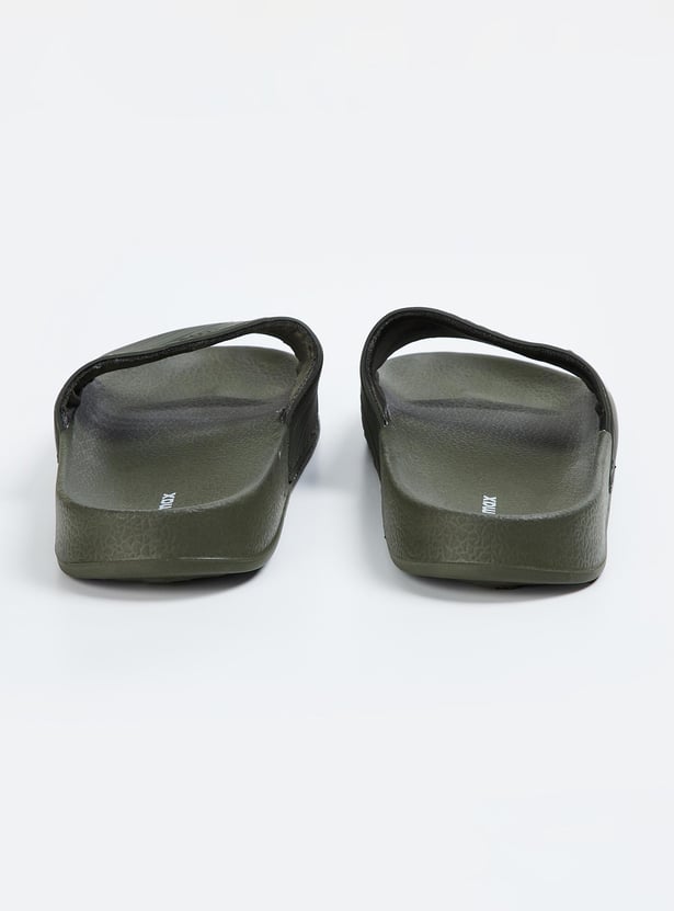 Buy Men Textured Slide Sandals Online at just Rs. 599.0 - 1000012421042 ...