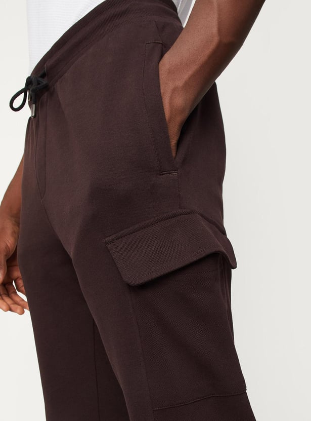 Buy Men Solid Cargo Joggers Online at just Rs. 1299.0 - 1000012658582 ...