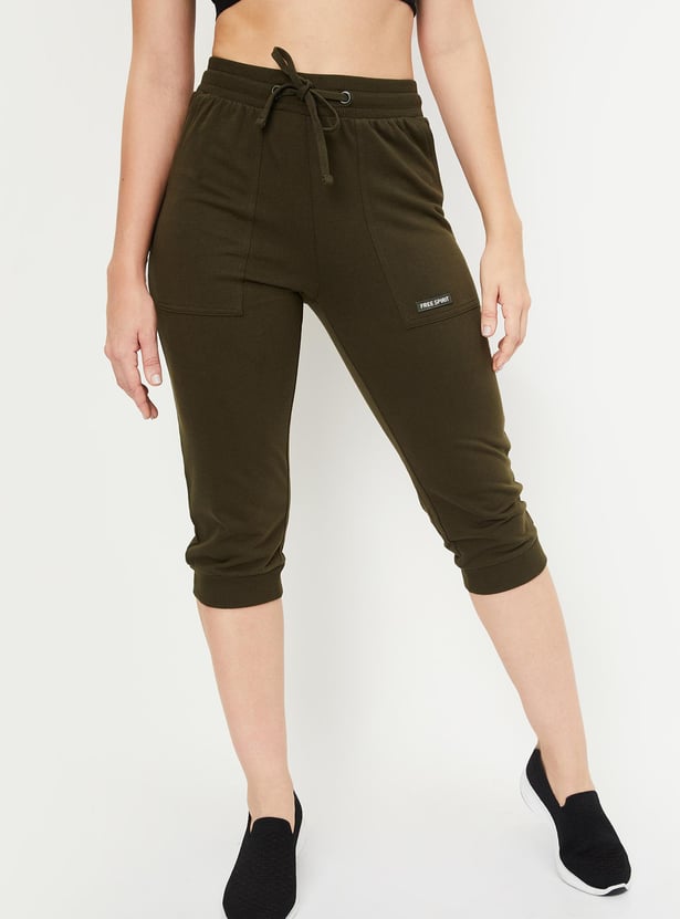 Buy Women Solid Athleisure Capris Online at just Rs. 599.0 ...